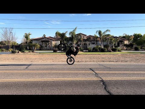 How to wheelie surron light bee x - YouTube