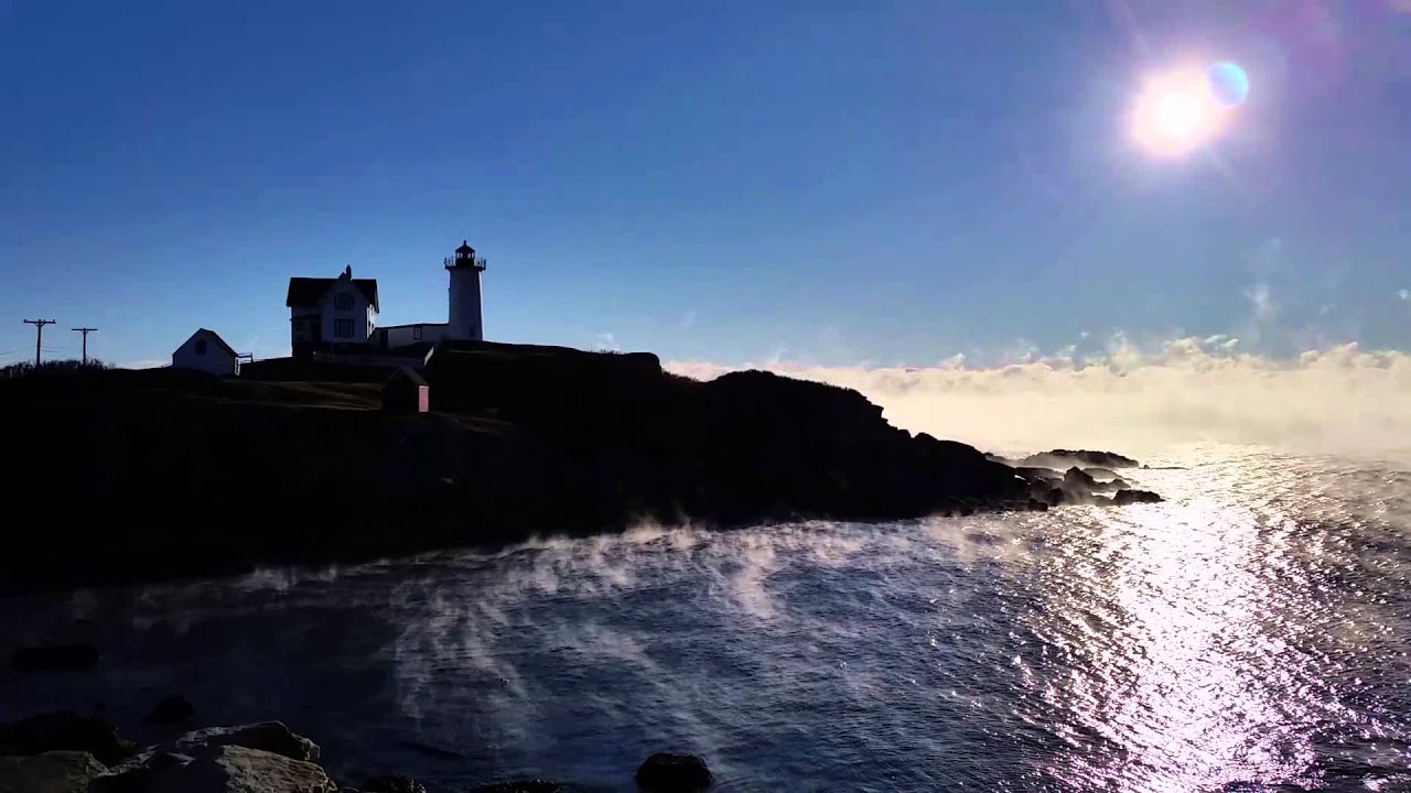 Nubble Lighthouse bathed in Sea Smoke - YouTube