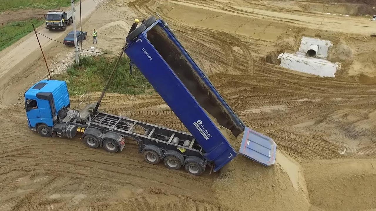 New Volvo FH4 with Grünwald tipper semitrailer unloading - Drone video ...