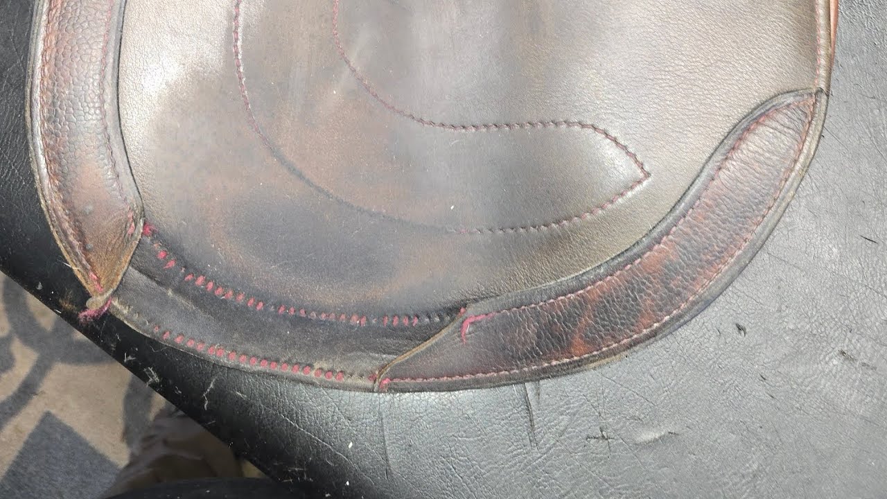 repairing flaps on a dressage saddle - YouTube
