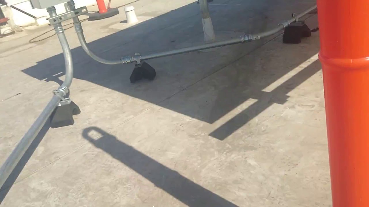 Dan Blount Electric show Salinas,ca running conduit on the roof - YouTube