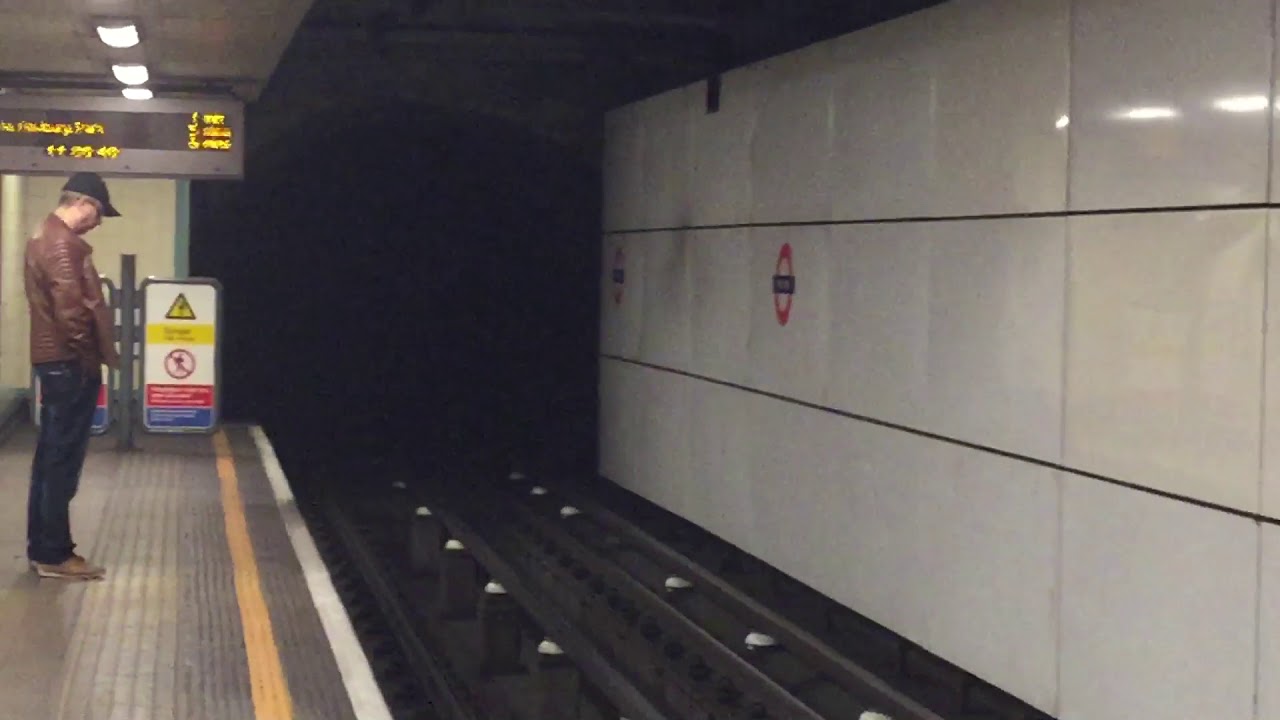 London Underground Central Line 1992 Stock Arriving Mile End - YouTube
