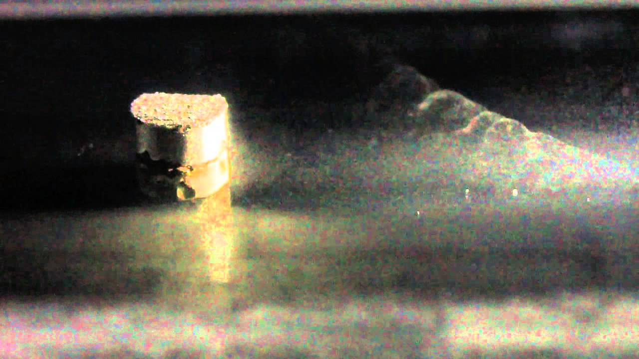 Muons vapor trails in a cloud chamber - YouTube