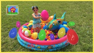SURPRISE EGGS HUNT IN A KIDDIE POOL + Giant Egg Opening Golden Surprise ...
