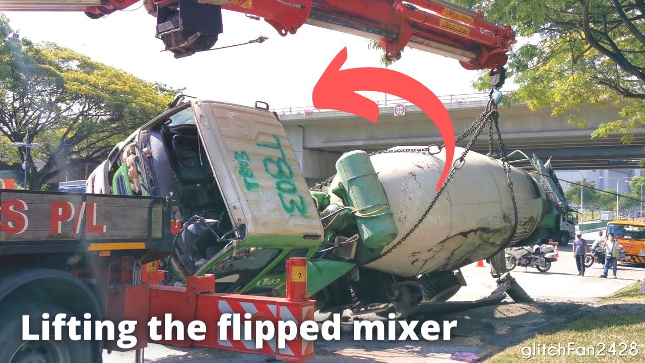 Lifting action! Singapore Cement mixer flips, spilling load - Aftermath ...