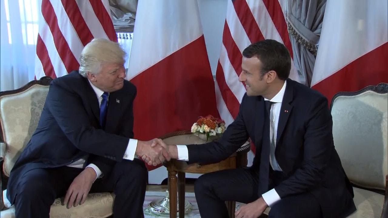 See President Trump and French President's Epic White Knuckle Handshake ...