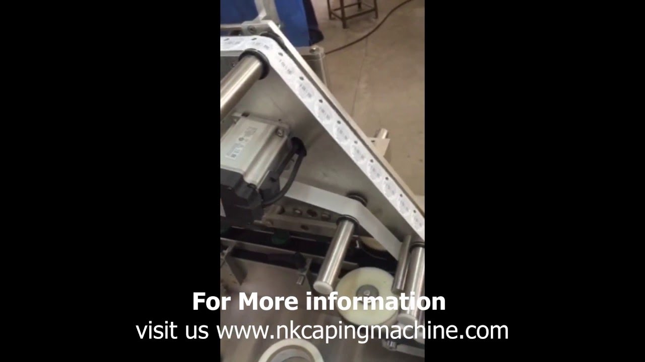 Automatic Lid Labeling Machine - YouTube