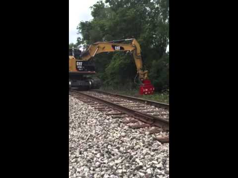 Cat Hi-Rail 320 and Fecon Brush Cutter - YouTube