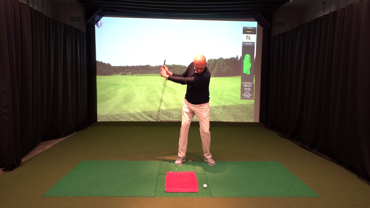 Golf Instructional Tip - Controlling the low point in your swing. - YouTube