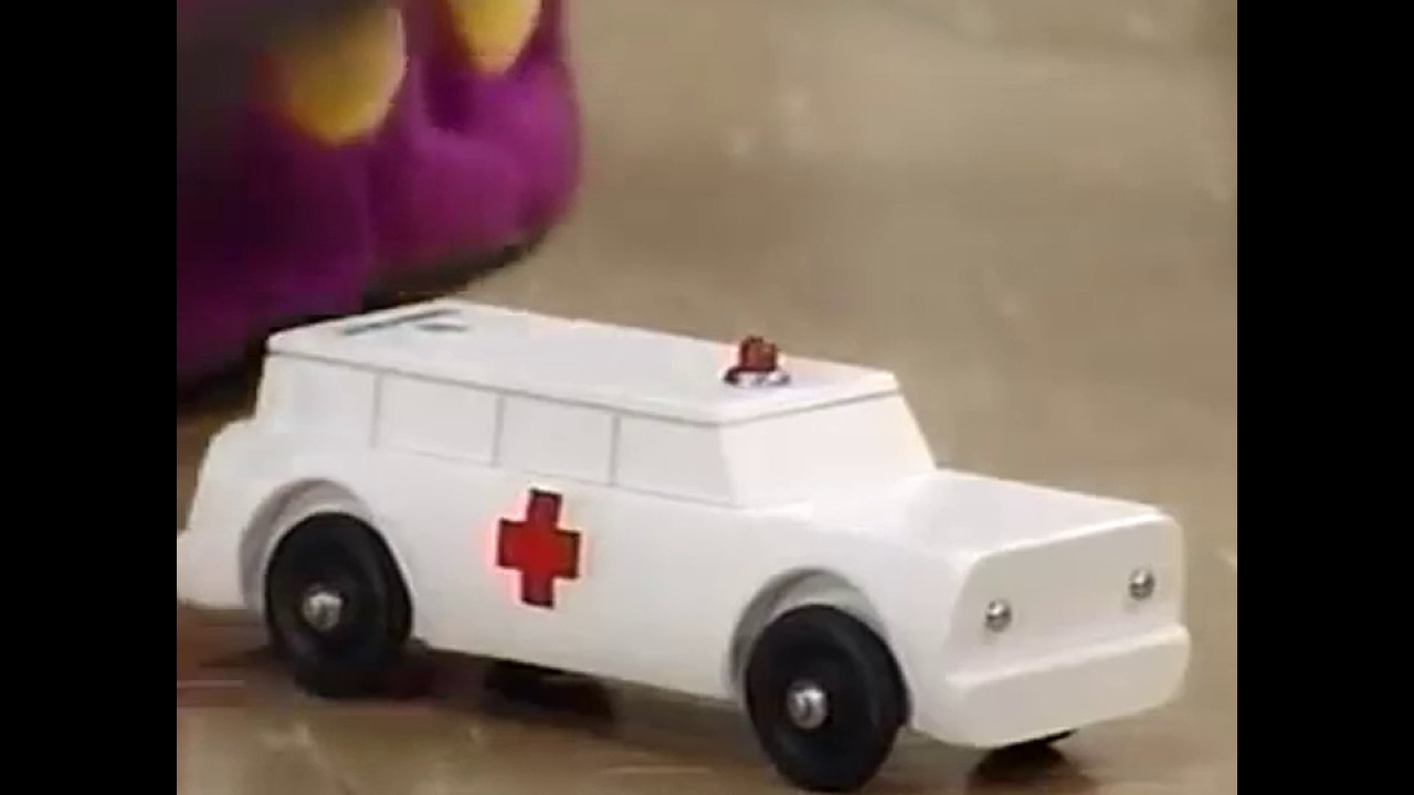 Barney slips on a toy car - YouTube