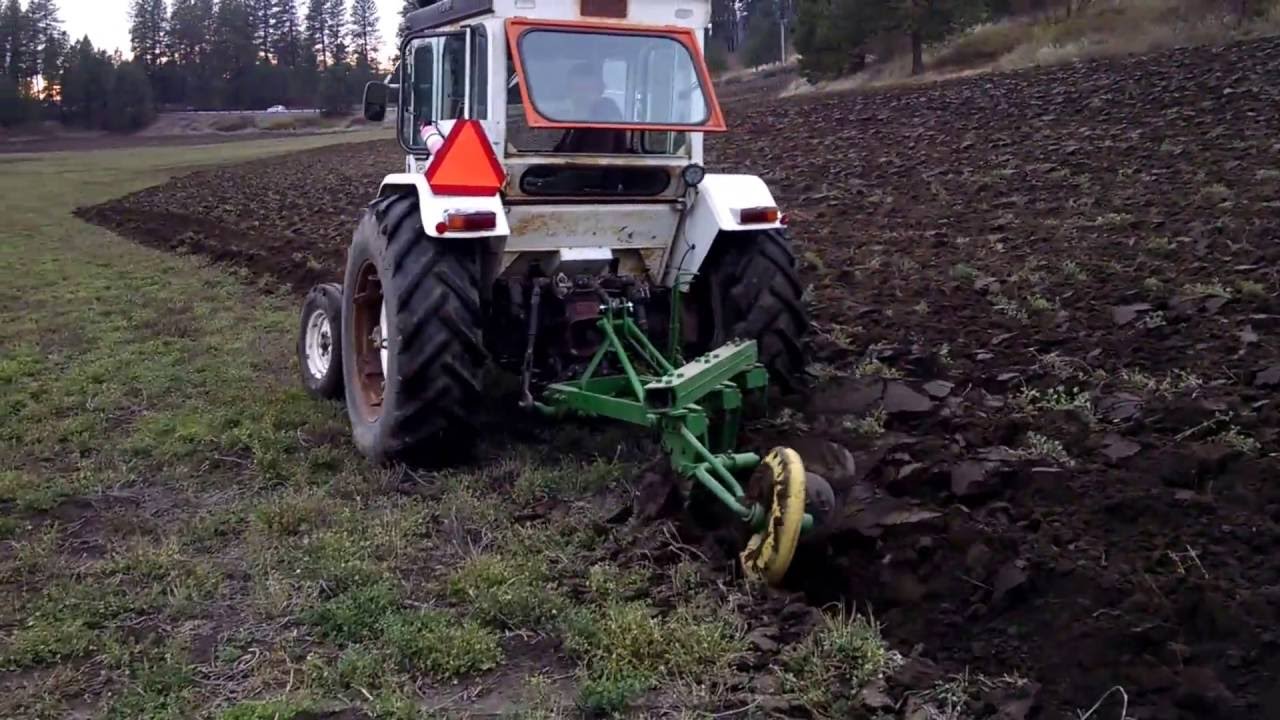 David Brown 995 pulling a JD 3 Bottom Plow #2 - YouTube