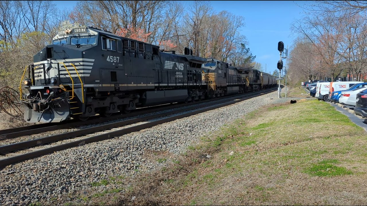 NS freight train rolls through Raleigh, NC headed east. 85 covered ...