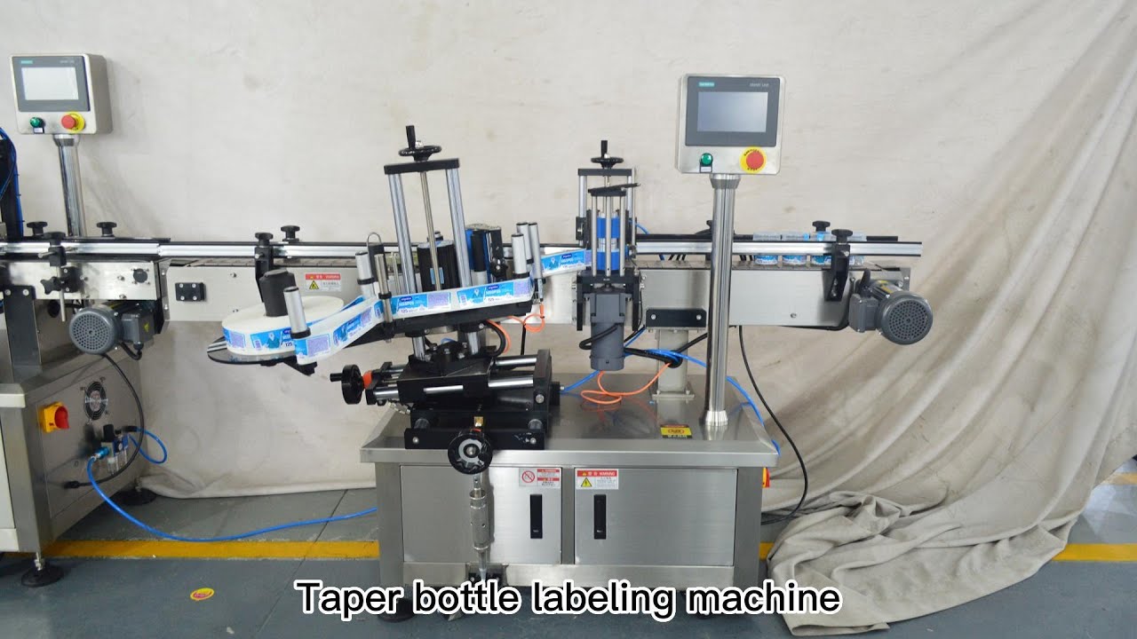 Taper labeling machine - YouTube