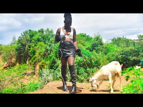 A LADY BUTCHERING WHITE GOAT FOR FOOD #slaughter #butcher