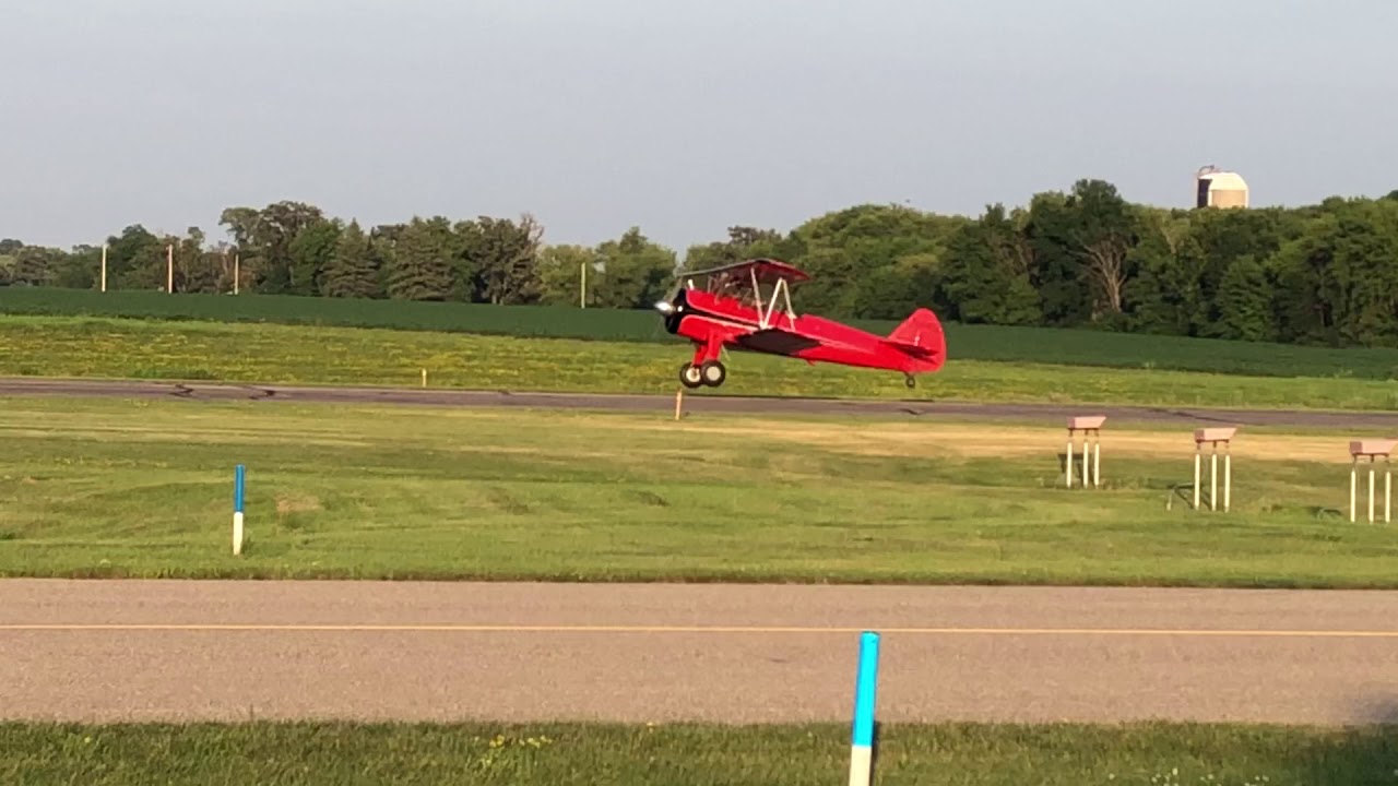CLASSIC VINTAGE BIPLANE RED BARON WWI AIRPLANE TAKES OFF FROM RUNWAY ...