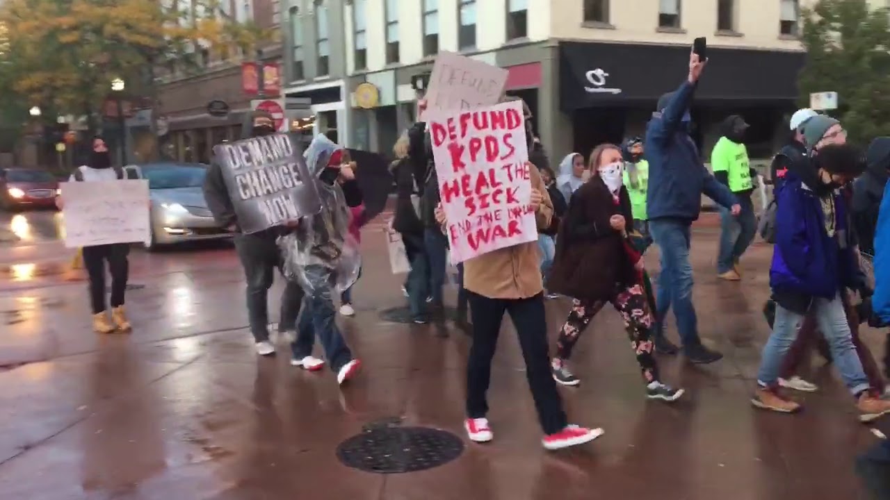 Protesters march in Kalamazoo calling for change at KDPS - YouTube