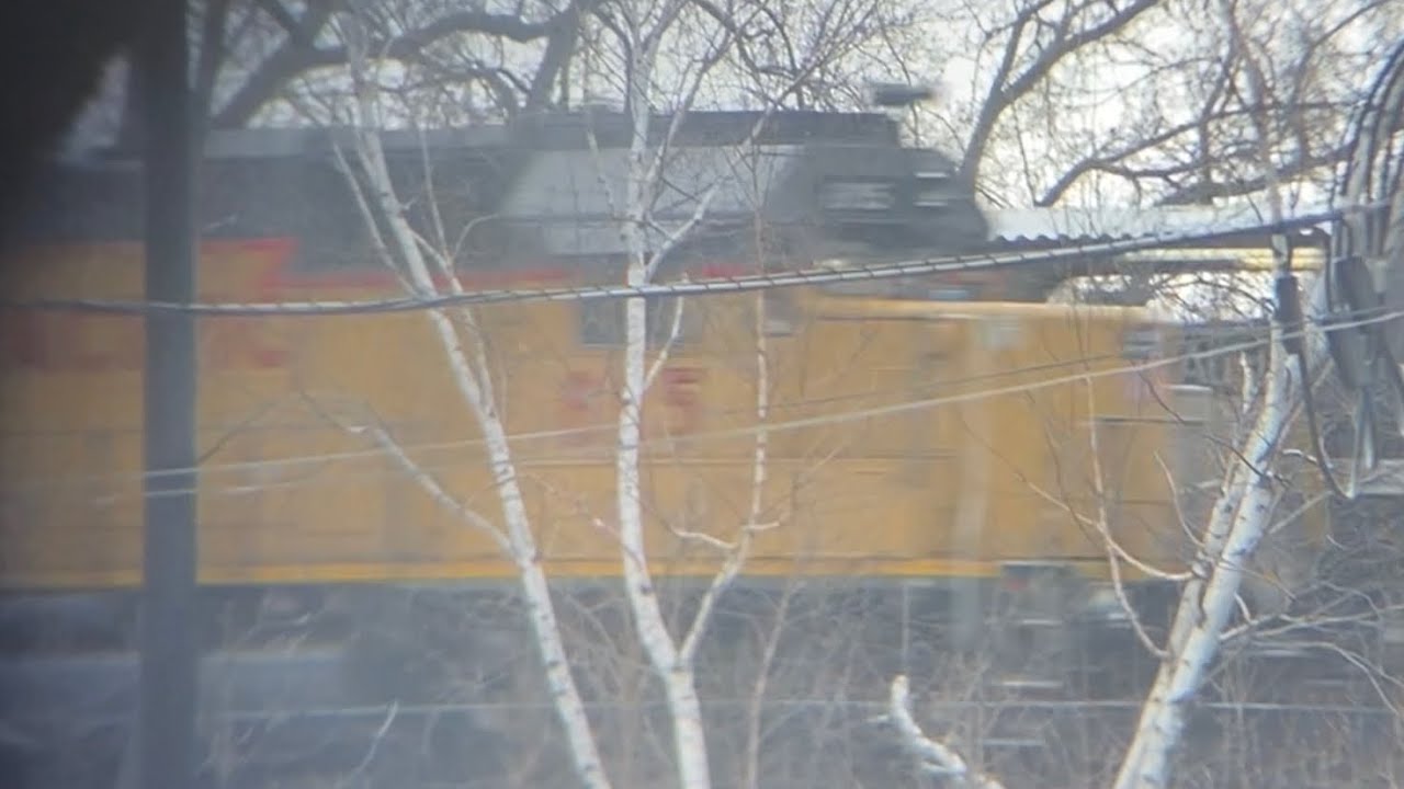 UP 815 pulls a 10AM eastbound YPR60 through Oak park IL from my window ...