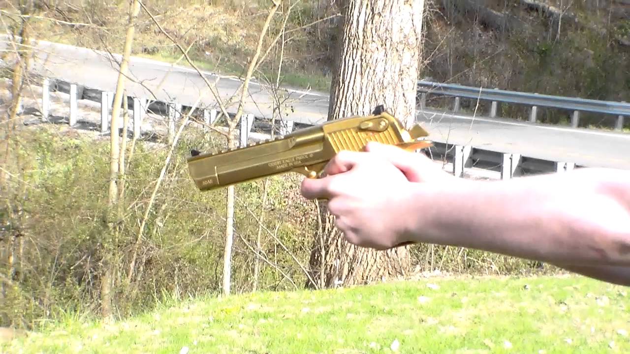 titanium gold 50 cal desert eagle shooting - YouTube