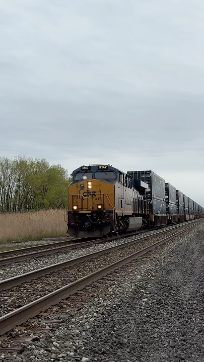 CSX 3147 rolls a intermodal past Pine Junction - YouTube