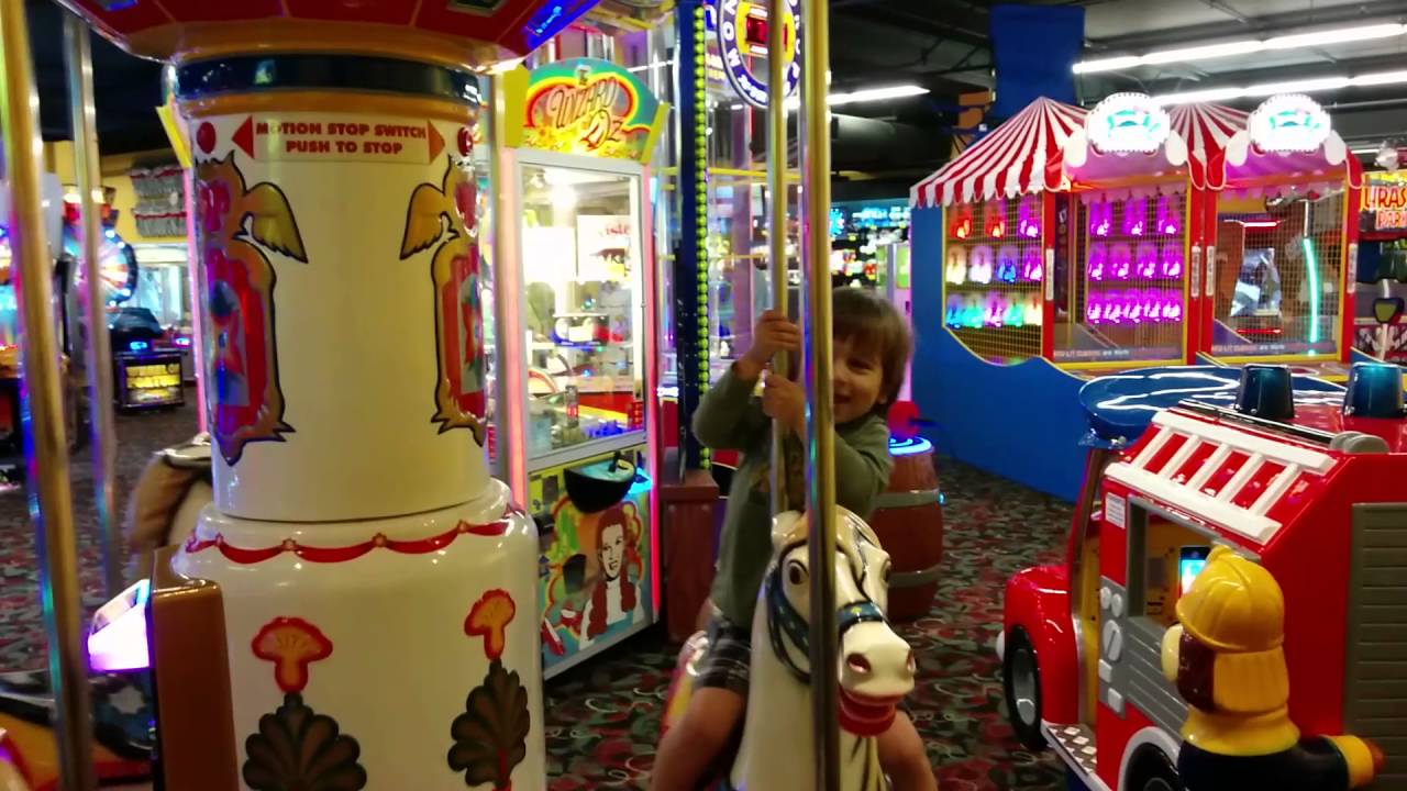 Sam on the carousel at Great Wolf Lodge - YouTube