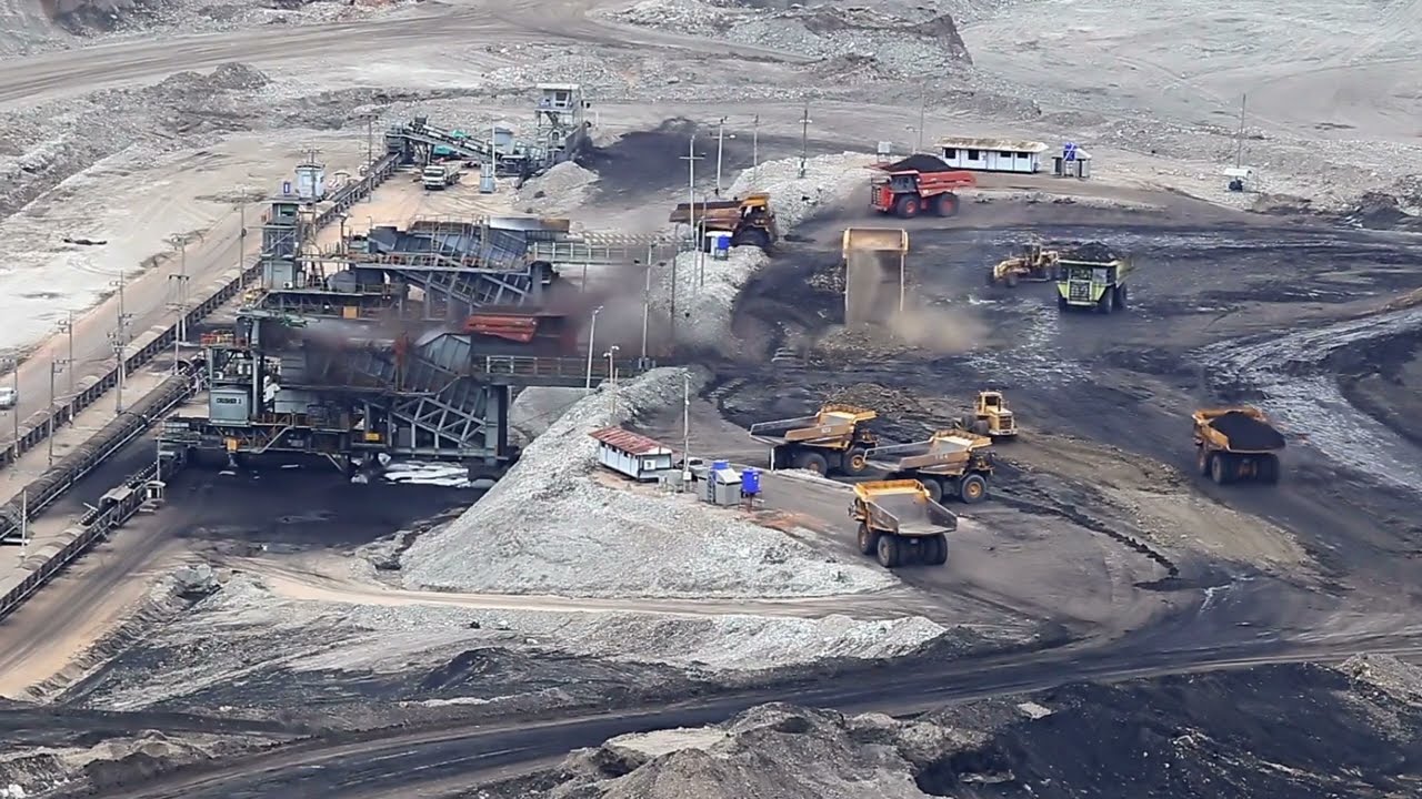 Heavy equipment at the mining land - YouTube