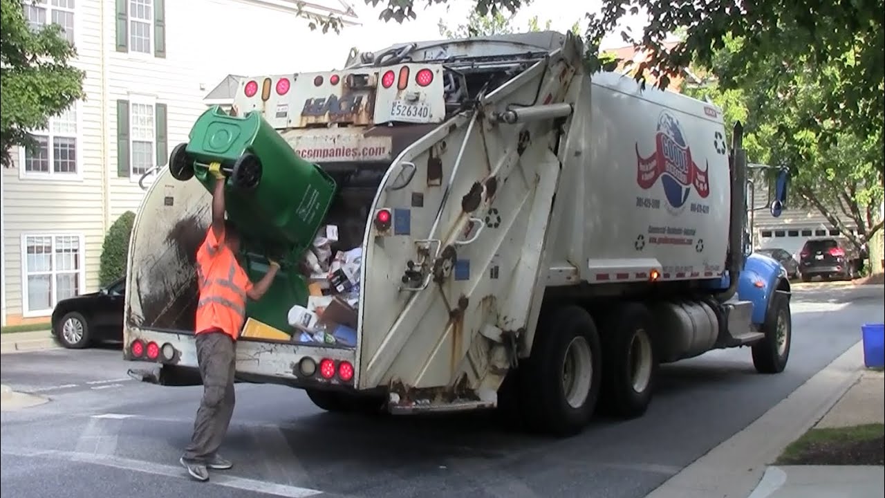 Fast Manual Recycling Collection with a Leach Rear Loader Garbage Truck ...