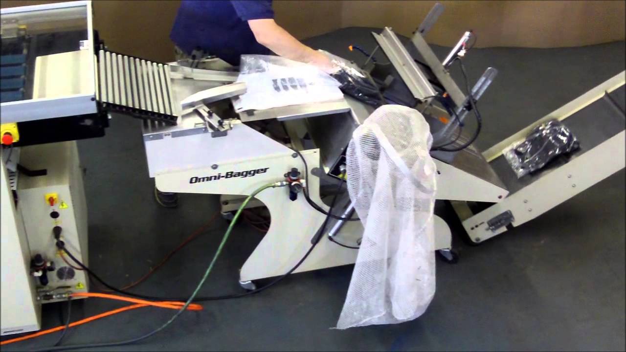 Automatic T shirt Folder - Amscomatic K840 - YouTube