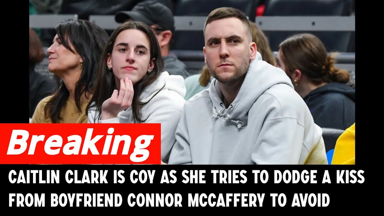 Caitlin Clark is coy as she tries to dodge a kiss from boyfriend Connor ...