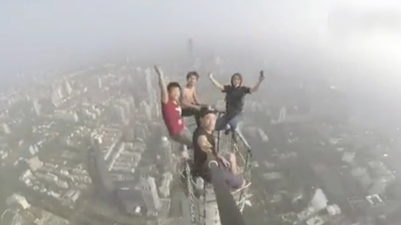 Chinese rooftopper shoots breathtaking video from world’s 10th highest ...