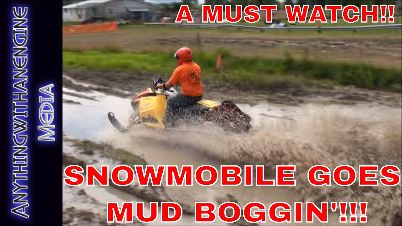 MUD SKIMMING SNOWMOBILER TAKES ON THE MUD PIT AT MOMS OLD FASHIONED MUD ...