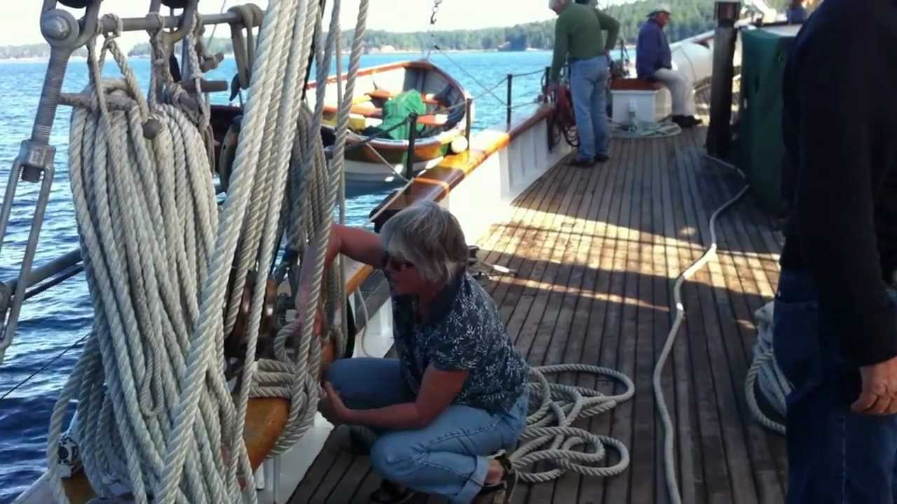 Rasing the port side topping lift during a tack - YouTube