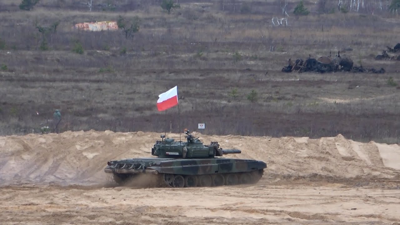 NATO testing its tank firepower in Latvia - YouTube