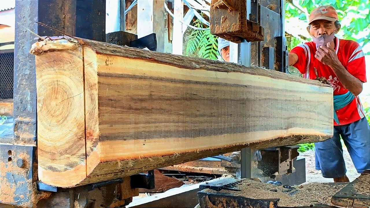 Splitting the old dry acacia wood into boards and beams. - YouTube