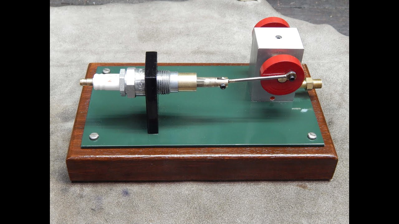 Steam engine made from a spark plug - YouTube