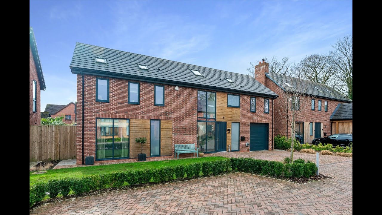 An impressive family home located in a quiet cul-de-sac off the ...