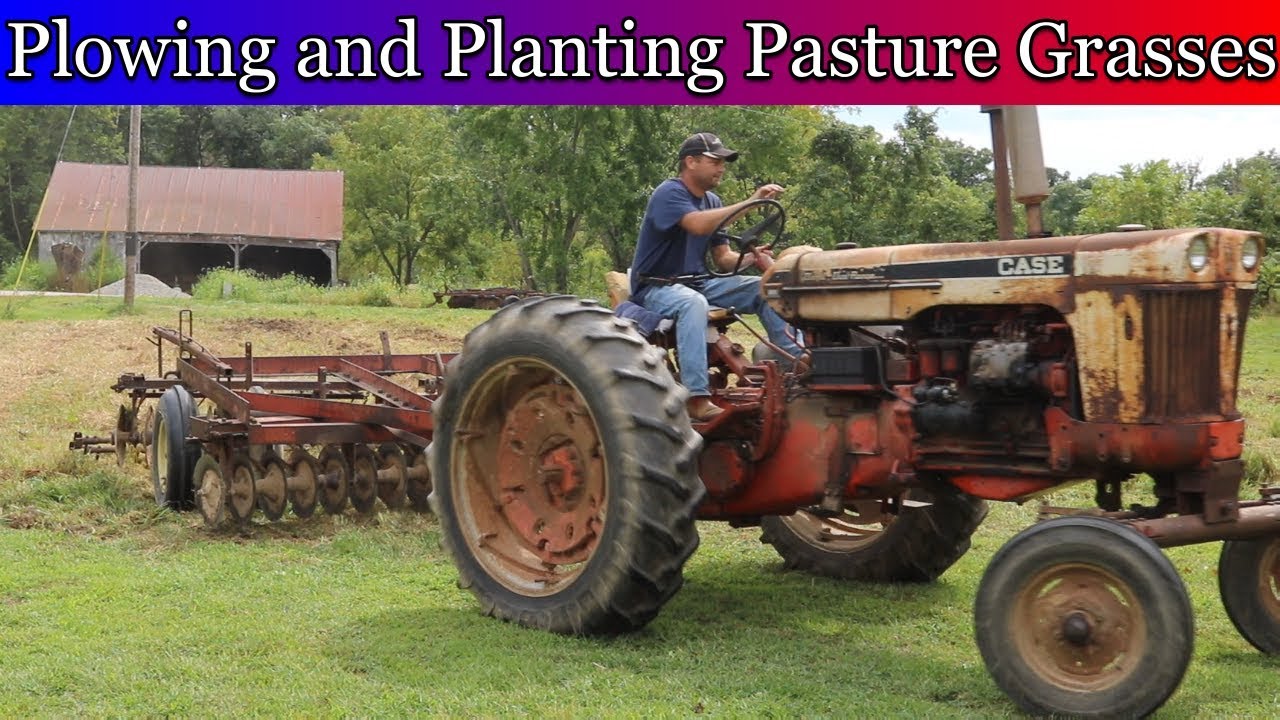 Plowing and planting pasture grasses where the old garden area was ...