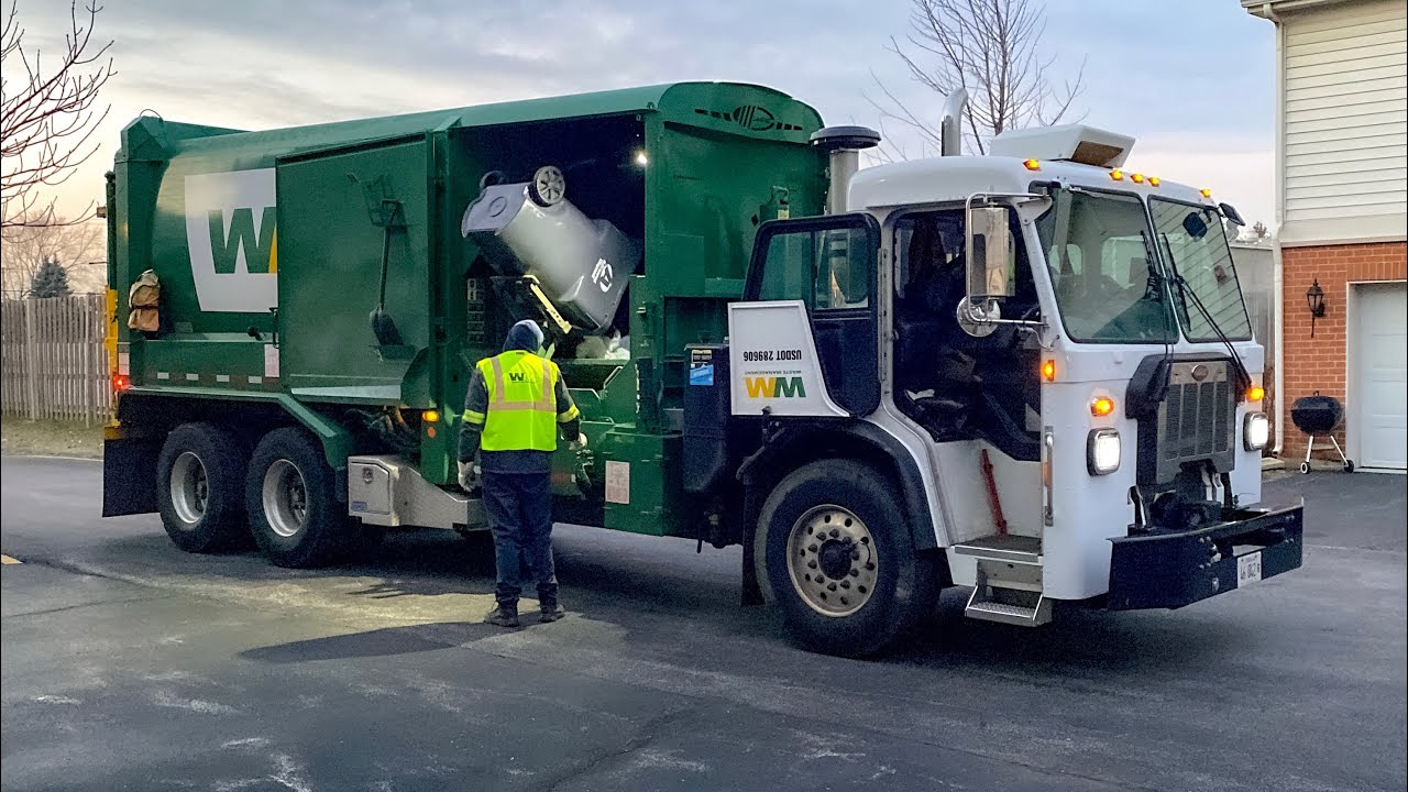 Waste Management Peterbilt 520 Split Labrie Manual Side Loader Garbage ...