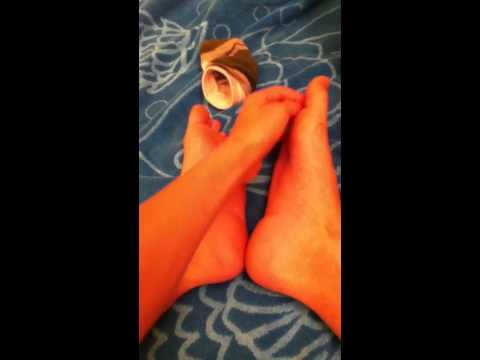 Tickling both of my feet at tue same time