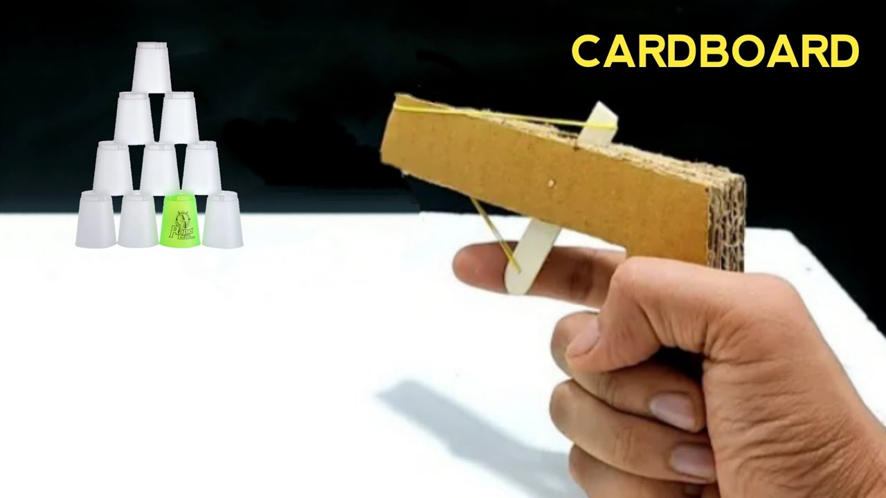 very easy || how to make a cardboard toy gun that can shoot rubber ...