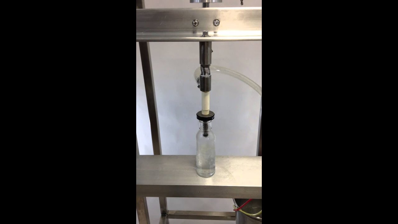 Single Head Bottle Filler Demo - YouTube