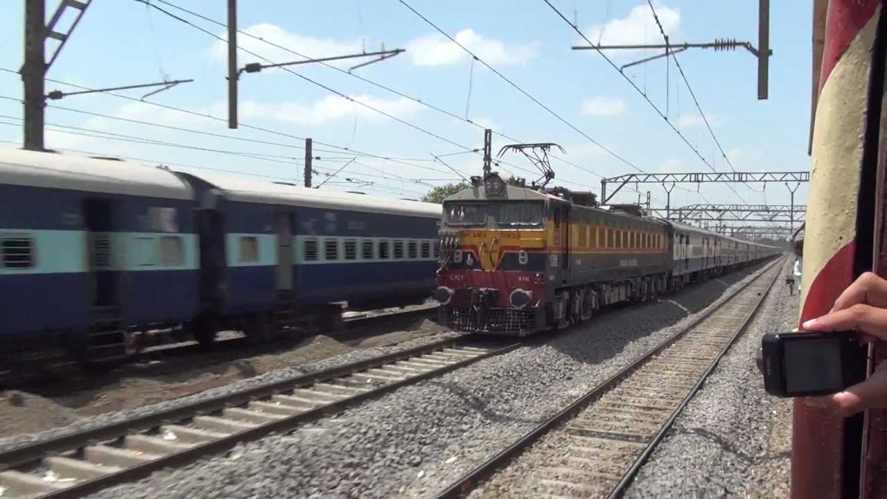 Capture Of Thrilling Parallel Action With Colourful Express Train ...