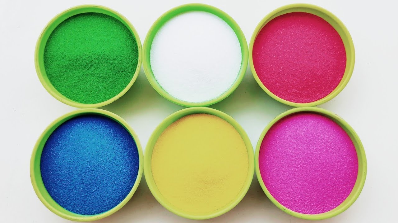 Sand rangolis art colorful peacock feather design with colors sand ...