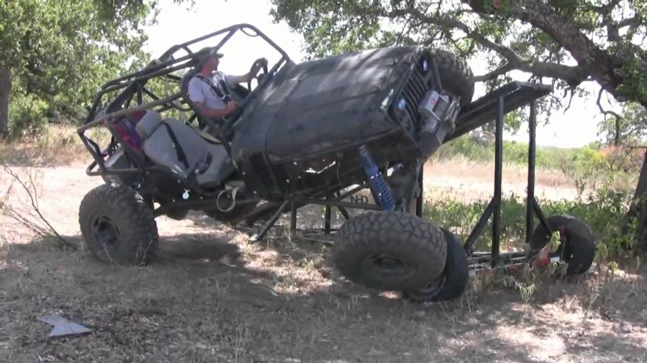 A couple of jeeps, flexing and floping on a RTI ramp - YouTube