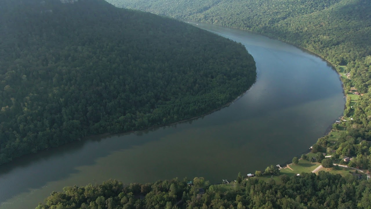 Natural BackGround Video : A River Flows Through The Mountains Valley ...