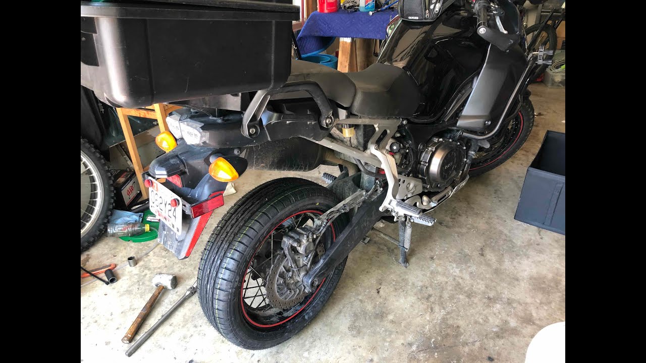 Installing a car tire on my motorcycle? Super Tenere Darkside - YouTube
