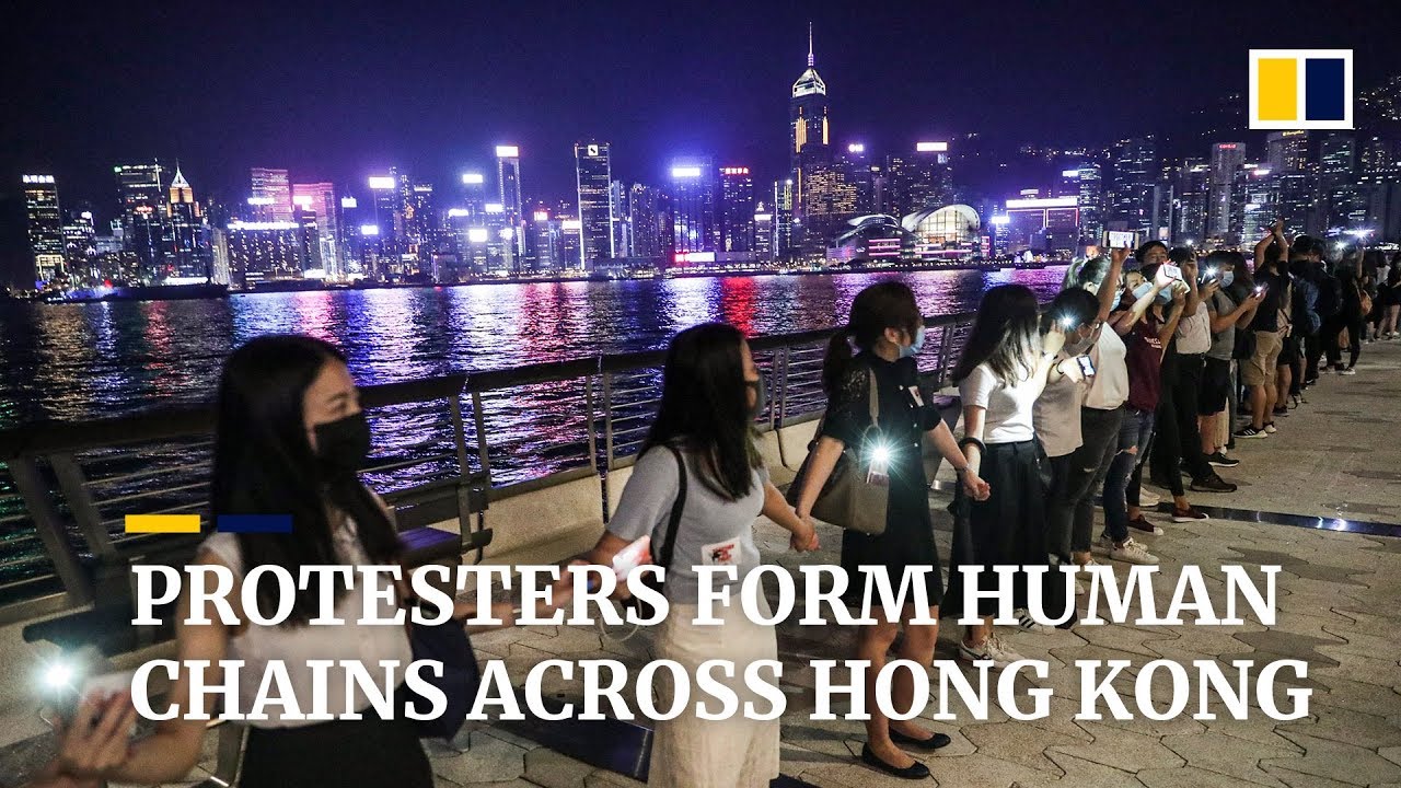 Protesters form human chains across Hong Kong - YouTube