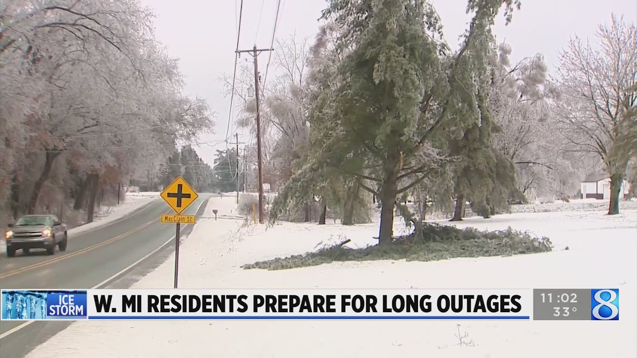 Thousands without power as freezing rain covers West Michigan - YouTube