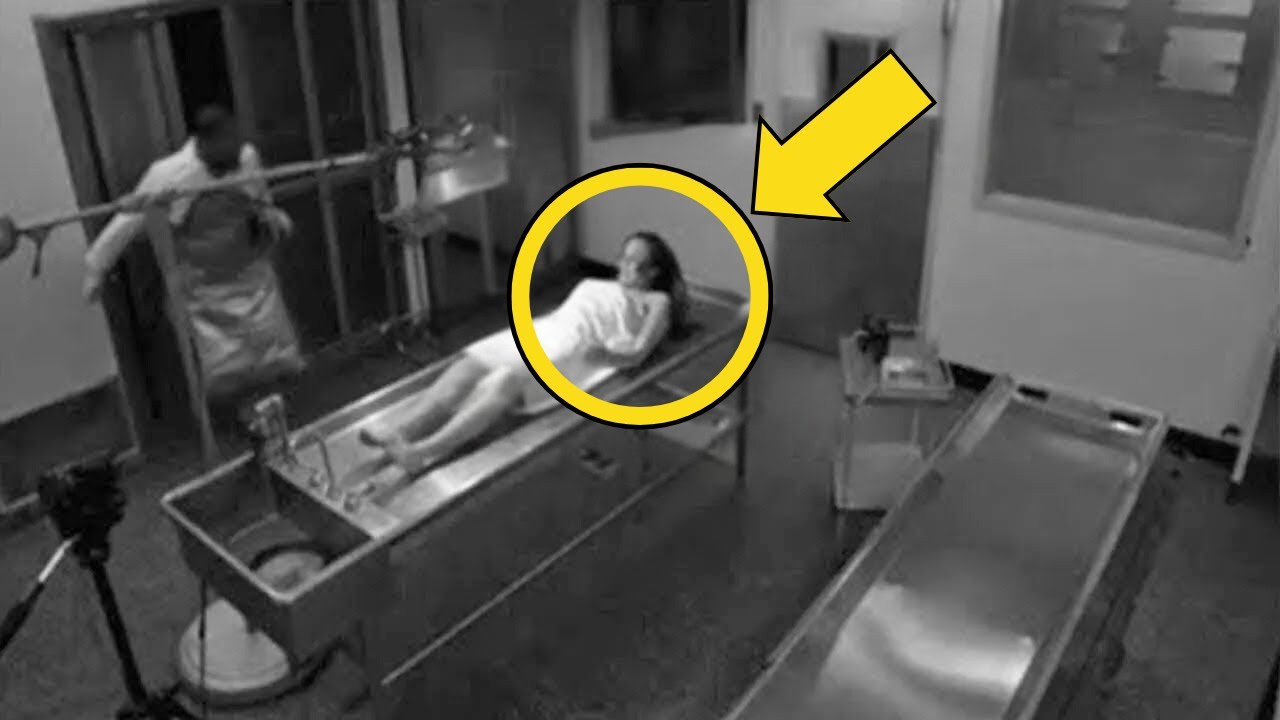 Dead Body Suddenly Comes to Life - Security Watches Mortuary Footage ...