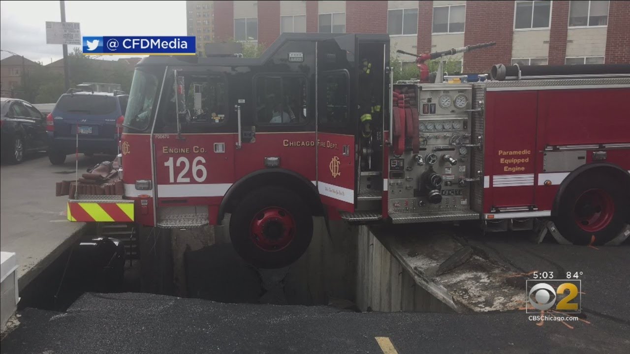 Crane Arrives To Help Remove Chicago Fire Engine From Collapsed Parking ...