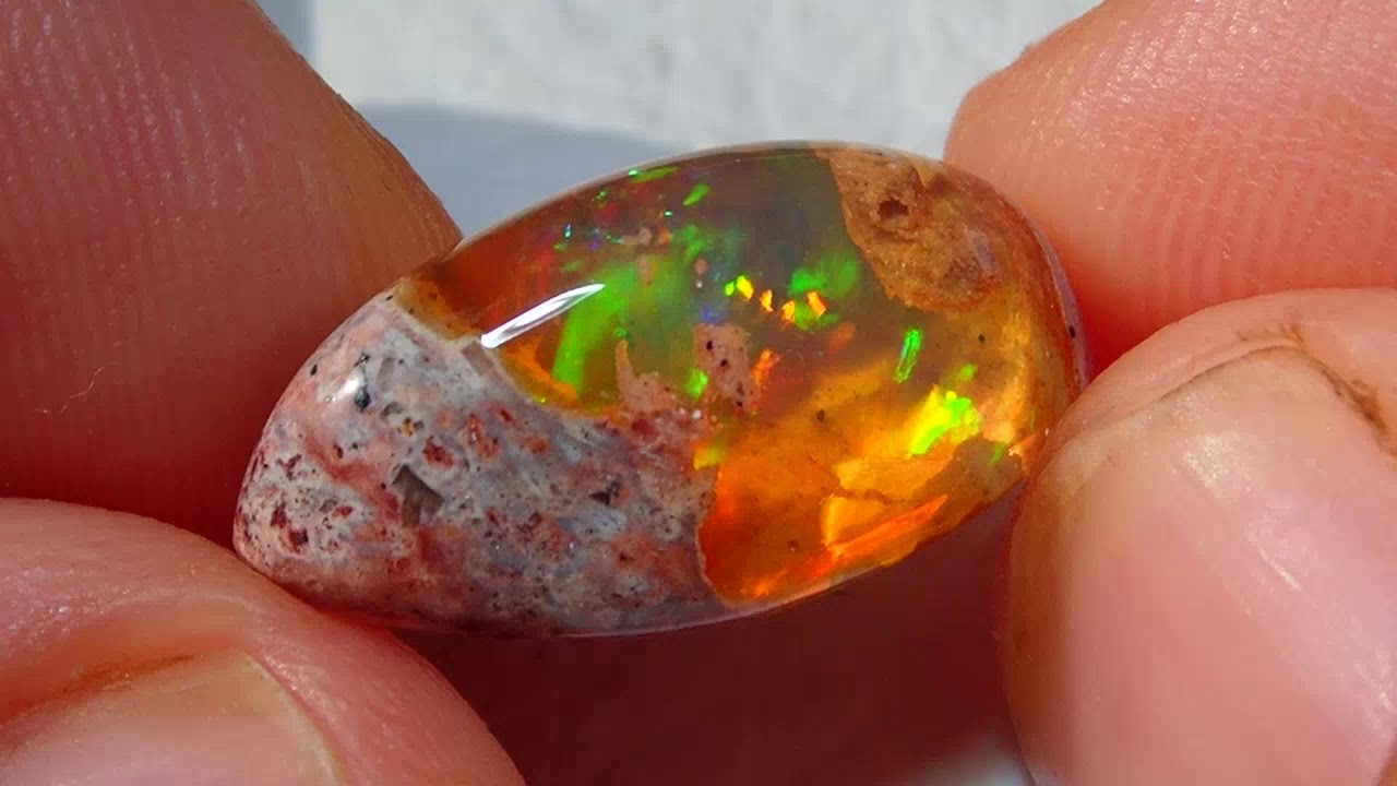 9.94ct Top Natural Mexican Matrix Cantera Multicoloured Fire Opal - YouTube